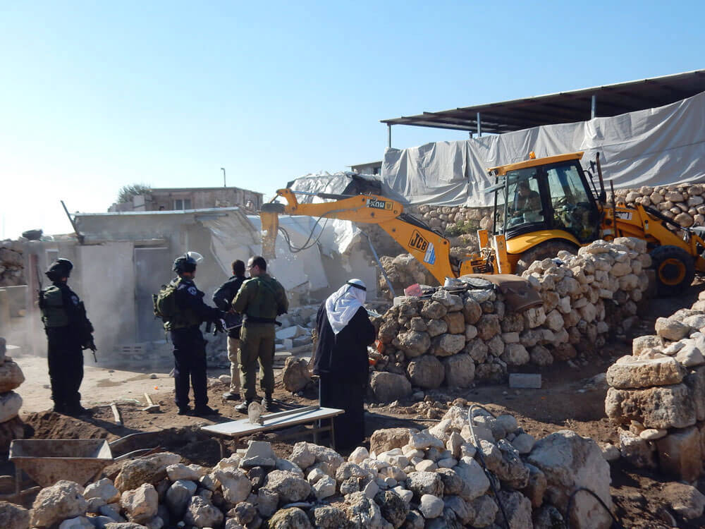 60 Palestinians homeless after Israel razes West Bank village for army ...